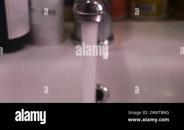 Closing tap Stock Videos & Footage - HD and 4K Video Clips - Alamy