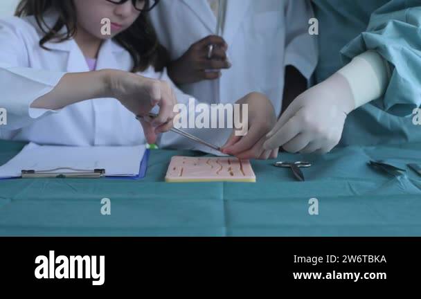 Education concept of 4k Resolution. Medical school students practicing ...