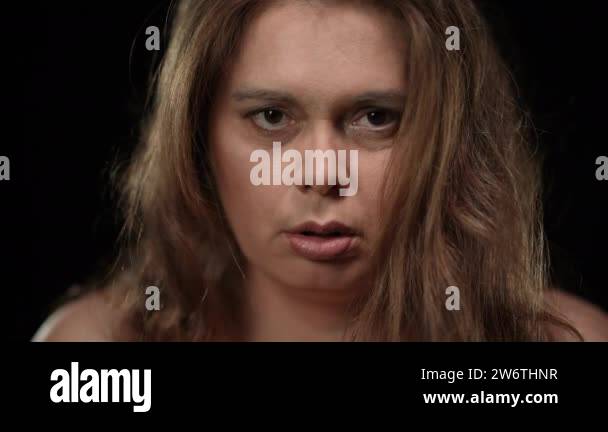 Headshot portrait depressed overwhelmed overweight woman chewing ...