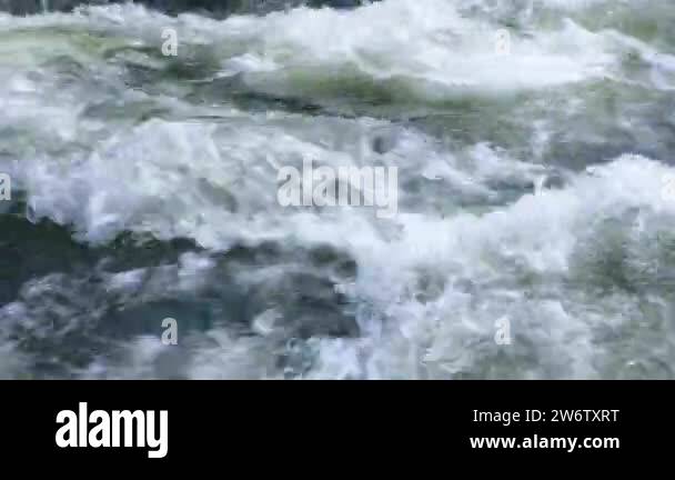 Mountain river water flow in powerful waterfall, video background. Fast ...