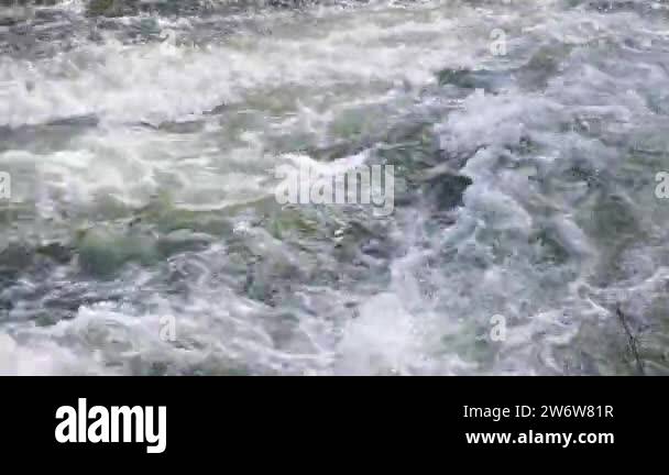 Mountain river water flow in powerful waterfall, video background. Fast ...