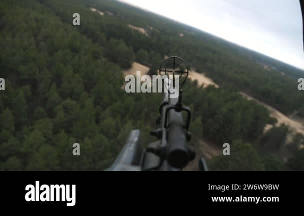 Contemporary machine gun with a big breech-sight fixed in a flying ...