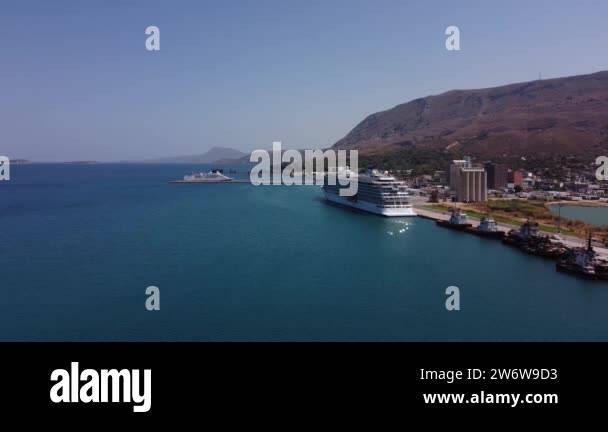 Crete, Greece. In the foreground - sea and pier of Heraklion port ...