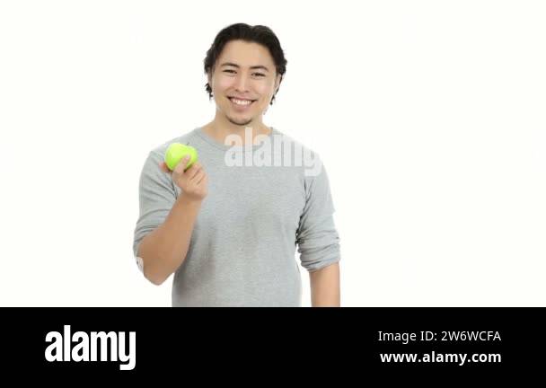 Handsome man apple Stock Videos & Footage - HD and 4K Video Clips - Alamy