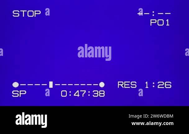 Real Analog VHS blue screen with stop and rew actions Stock Video ...