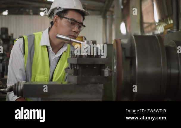 Asian professional mechanical engineer or operation man wear uniform ...