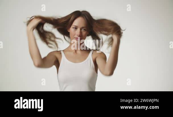 Woman With Long Hair And Wearing White Smiling Stock Video Footage - Alamy