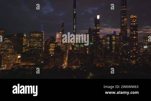 Night city scene. High rise buildings and downtown skyscrapers against ...