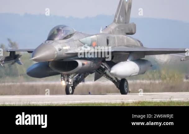 Military pilot in the cockpit of a supersonic NATO jet plane with fuel ...