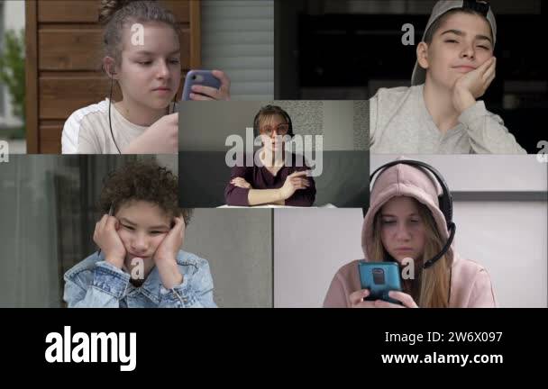 Teacher conducts a video lesson for a group of students. Students are ...