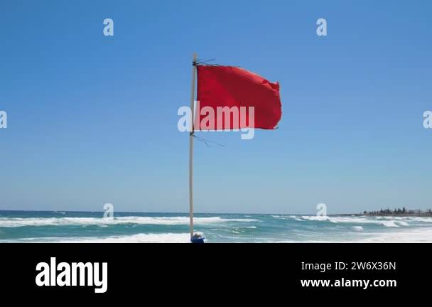 warning about the prohibition of swimming red flag on the beach. Cyprus ...