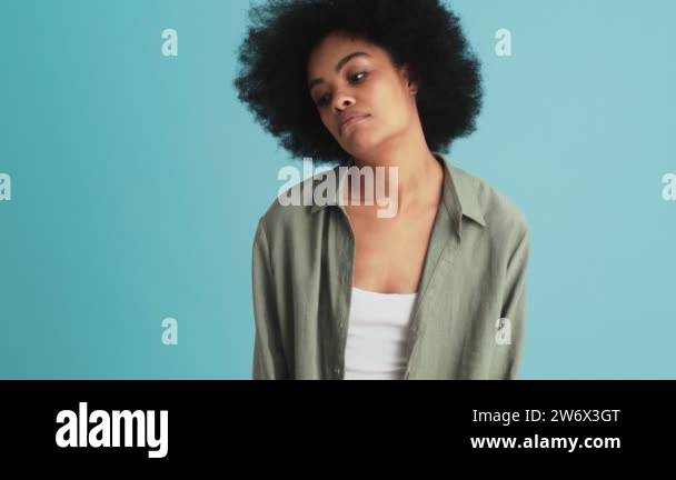 The tired black woman reluctantly showing her palm to the side while ...