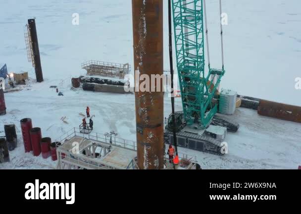 Sabetta, Tyumen region, Russia - March 25, 2021: The pile driver drives ...