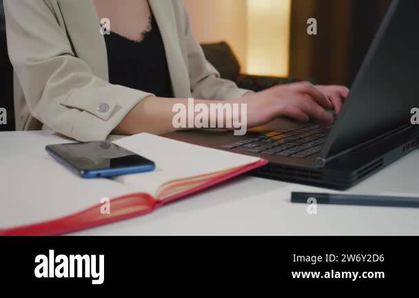 Close up typing on laptop. Woman hands professional using typing ...