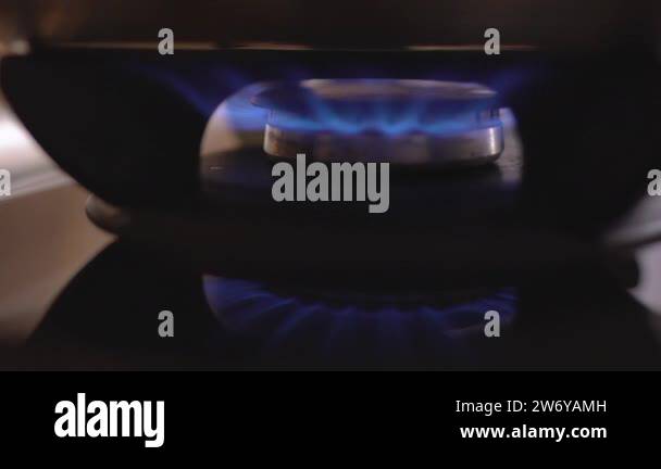 Gas stove burner lighting Stock Video Footage - Alamy