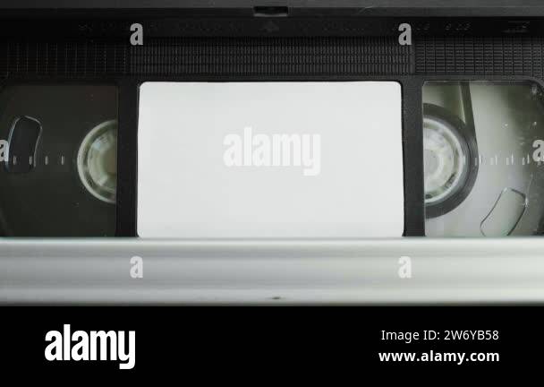 Video Cassette Tape. Inside, smoothly, rotates reels with the film ...