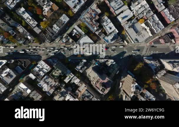 Aerial birds eye overhead top down panning view of traffic on multilane ...