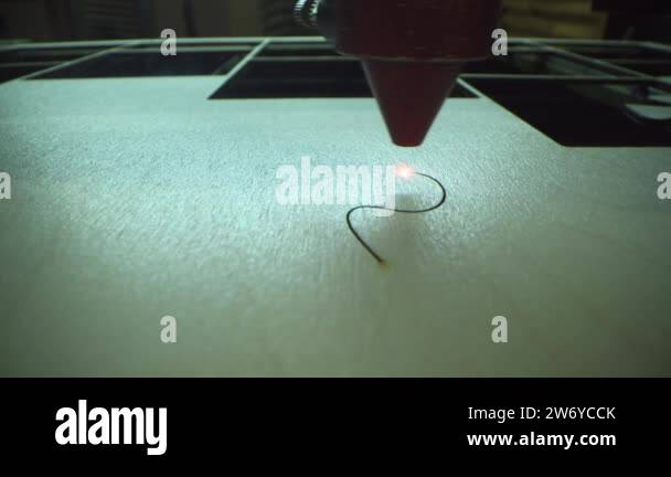 Automatic wooden jigsaw puzzle production on toys factory. 4k macro hdr ...