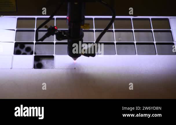 Automatic wooden jigsaw puzzle production on toys factory. 4k macro hdr ...