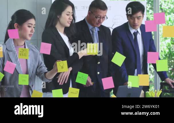 4k uhd handheld of creative agency business brain storm meeting ...