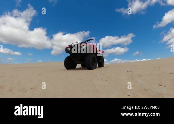 Riding a 4x4 offroad vehicle in the dunes waves, Jericoacoara, Ceara ...
