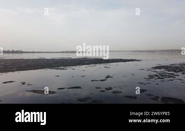 Melting ice flowing on water surface. Ice drift on the river. Global ...