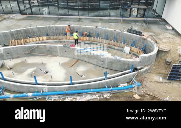 Pool construction. a construction site on which a swimming pool and a ...