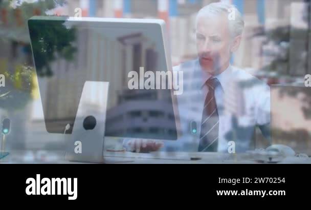 Animation of street over businessman using computer next to boxes in ...