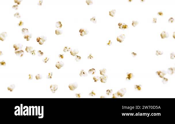Flying many popcorns on white background. White salty popcorn. Healthy ...