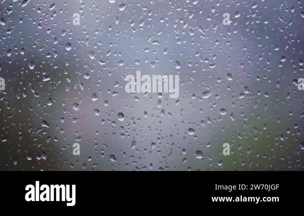 Window with rain drops, condensate or steam after heavy rain, large ...