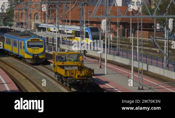 Yellow Locomotive is Moving Approaching Driver Trains are Standing ...