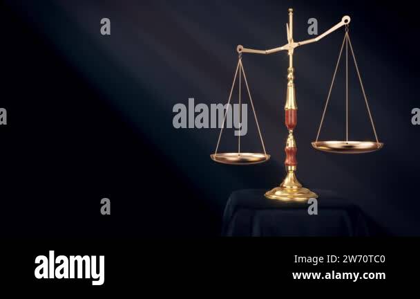 Golden traditional balance scale against a black background with rays ...