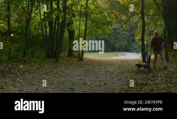 Man is Sitting at The Bench Man is Half Turned Man Has Stood Up Running ...