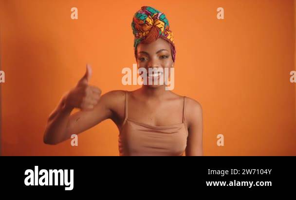 African woman shows class with one hand. Sign language. Black girl ...