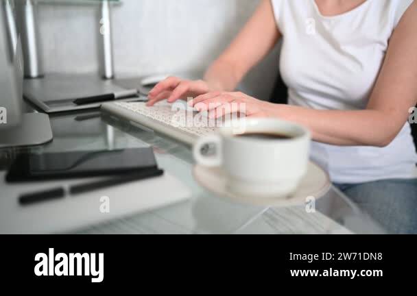 Technology concept - close up hands of unrecognizable woman sitting in ...