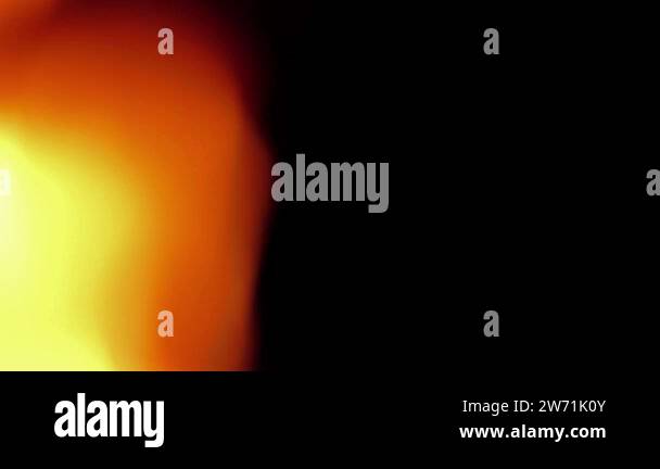 Blurred fire flames on a black background. Abstract fiery texture ...