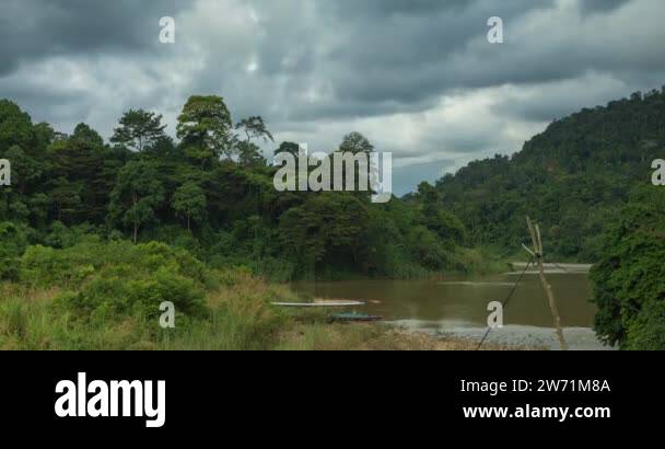 Landscape timelapse of the Tembeling River and surrounding jungle, on a ...