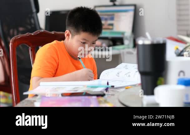 boy doing homework, child writing paper, education concept, back to ...