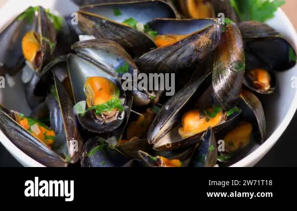 Moules mariniere fresh steamed mussels Stock Videos & Footage - HD and ...