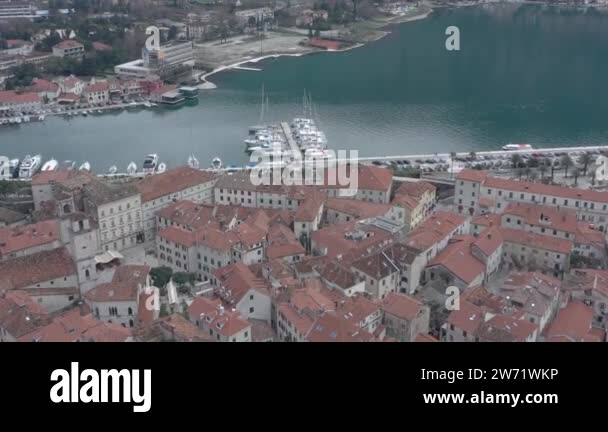 Aerial shooting of an ancient balkan town Kotor, traditional balkan old ...