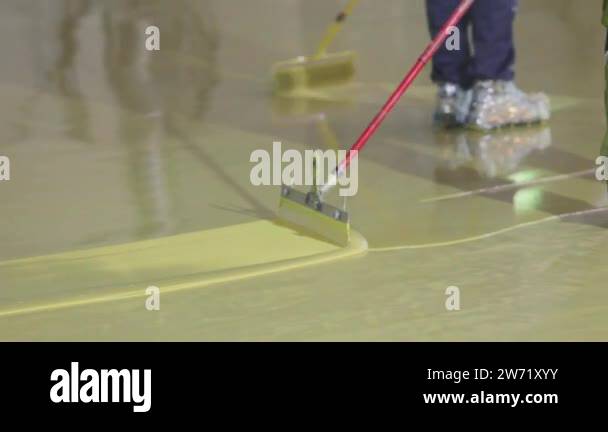 Applying self-leveling floor to the surface. How to create a self ...