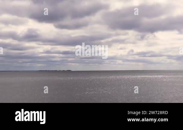 Dawn on the river, the horizon line is visible in the distance, the ...