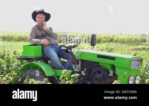 Farmer sitting on a tractor Stock Videos & Footage - HD and 4K Video ...