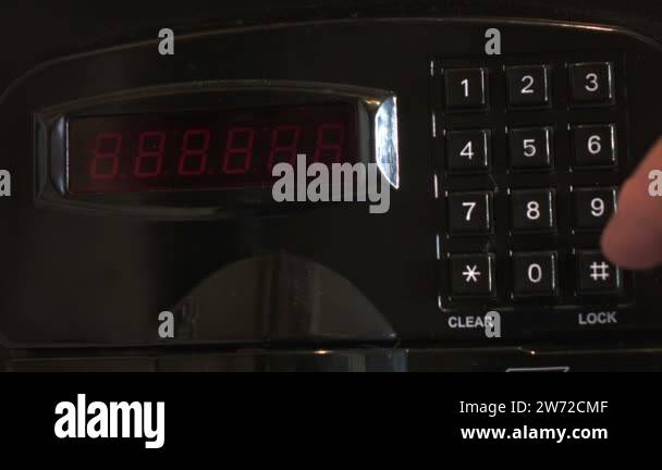 man tourist press key on safety lock Pad number close up. Secret ...
