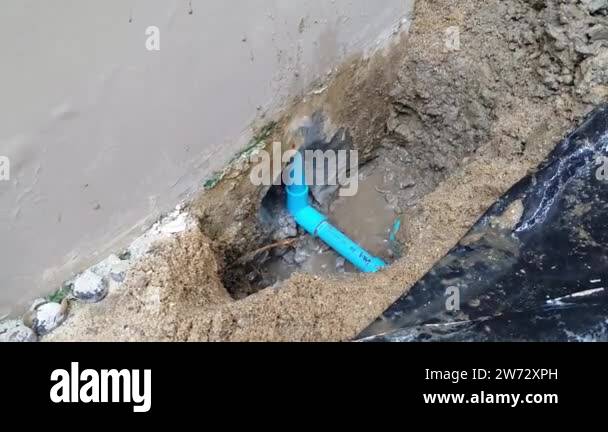 Fixing Broken water pipe leaking and splashing water liquid to the air ...