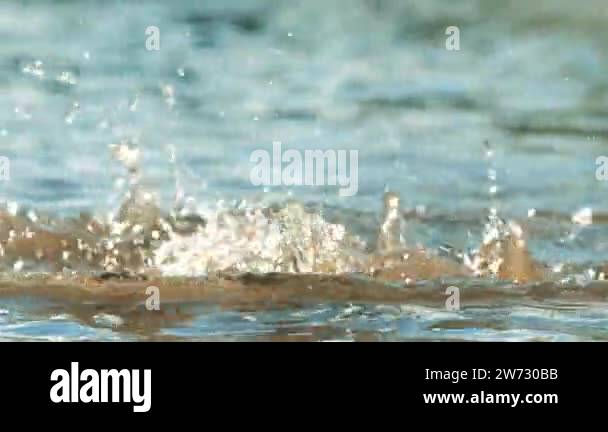 Water splash causes waves Stock Videos & Footage - HD and 4K Video ...