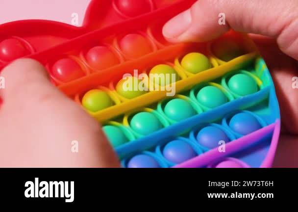 Close up Pop It Antistress game fidget. Pop Fidget Sensory Toy for ...