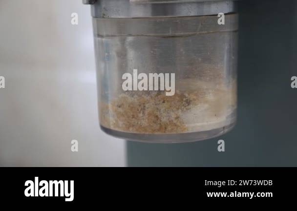 Grain quality analysis with a see-through mixer rotating fast in a laboratory Impressive view of ...