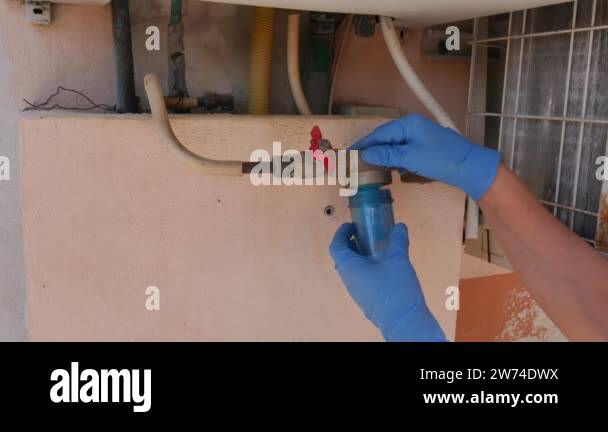 cleaning and disassembly and filling of a boiler anti-limescale dosing ...