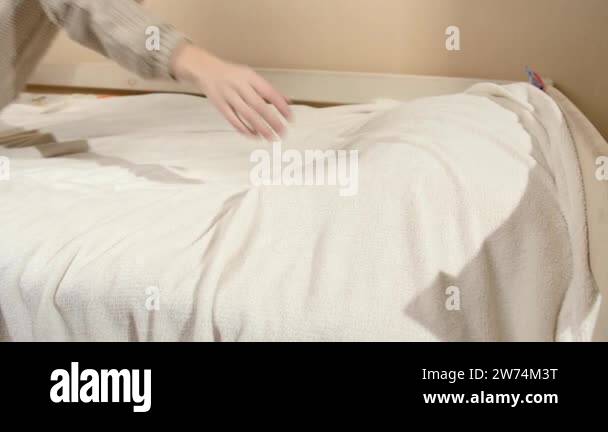 Crying teenage girl jumping on bed and lying on soft pillow Stock Video ...